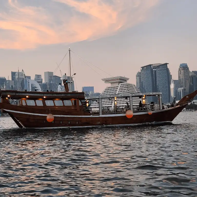 Experience Doha's Charm: Sunset Dhow Cruise - DubaiThingsToDo